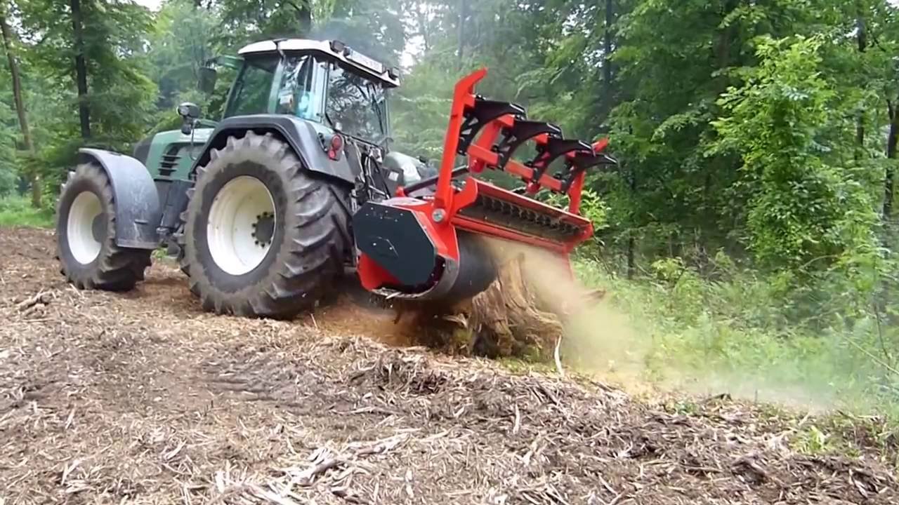 An innovative system attached to the tractor for grinding tree stumps ...