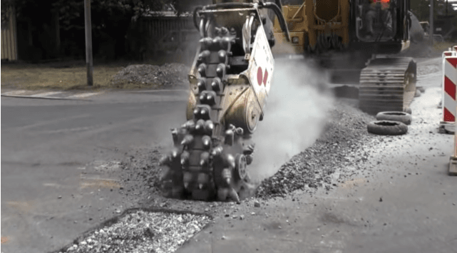 KEMROC EK 140 chain cutter – A powerful machinery that eat the asphlalt ...